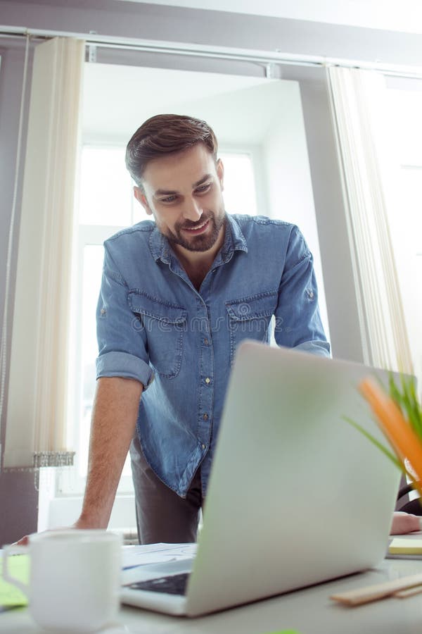 Attractive Young Guy is Working on Computer Stock Image - Image of ...