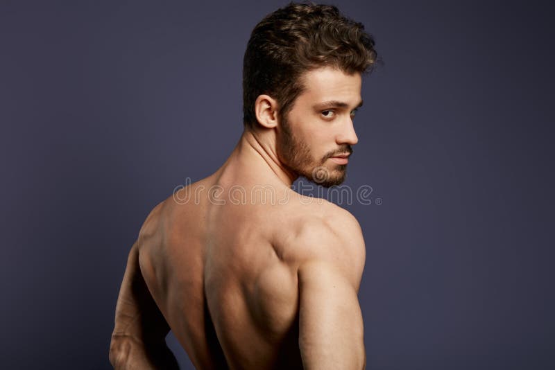 Attractive Young Mach Looking Back Stock Photo - Image of attractive ...