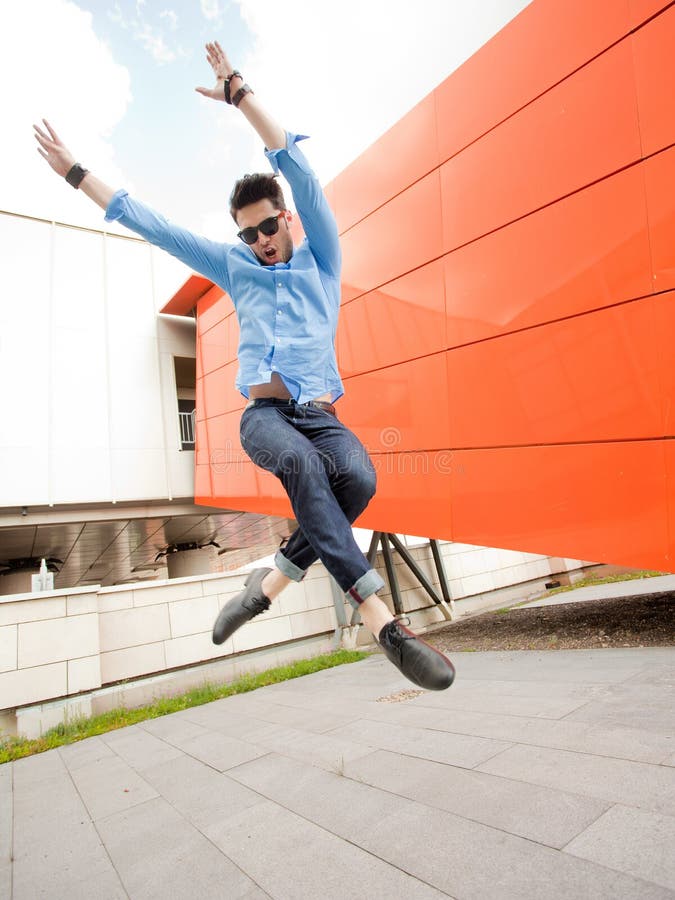 Attractive Young Male Model Jumping Outdoors Stock Photo - Image of ...