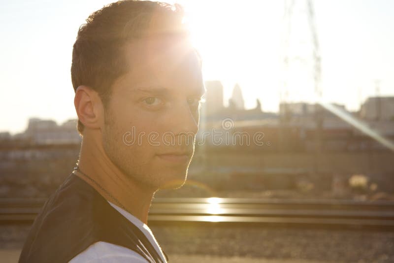 Attractive Young Man Backlit Stock Image - Image of hair, color: 10877071