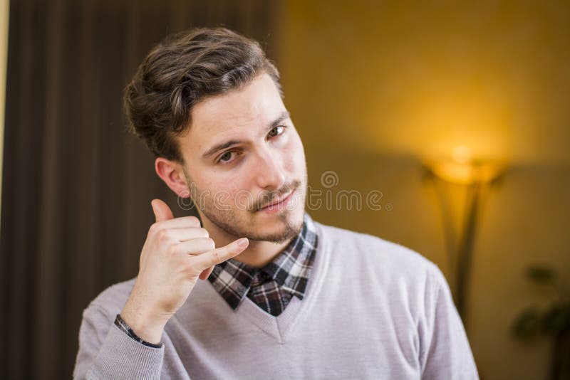 Attractive Young Man Doing Call Me Sign with Hand and Fingers Stock ...