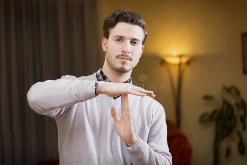 Attractive Young Man Doing Time-out Sign Stock Image - Image of white ...