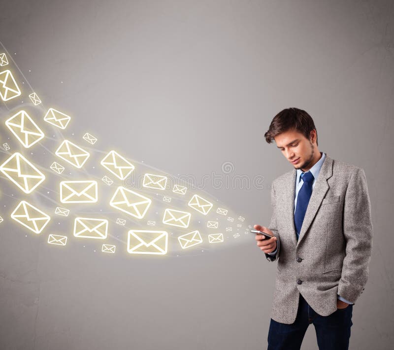 Attractive Young Man Holding a Phone with Message Icons Stock ...