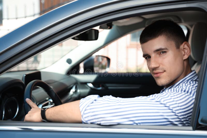 Attractive Young Man in Modern Car Stock Photo - Image of modern, owner ...