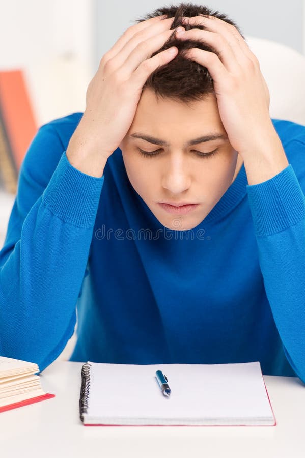 Attractive Young Man Studying Lessons. Stock Photo - Image of ...
