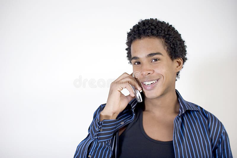 Attractive Young Man Talking on a Cell Phone Stock Photo - Image of ...
