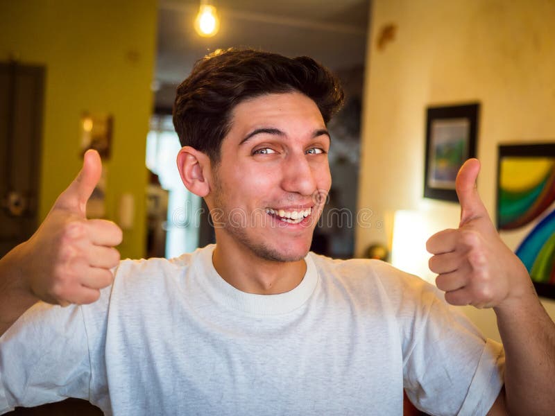 Attractive Young Man with Thumbs Up Doing OK Sign Stock Image - Image ... Attractive Young Man with Thumbs Up Doing OK Sign Stock Image - Image ...