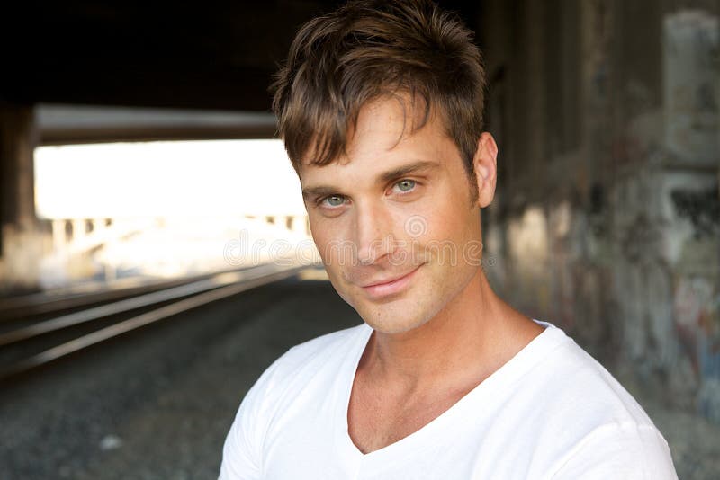 Attractive Young Man Wiith a Smirk Stock Image - Image of cool, dude ...