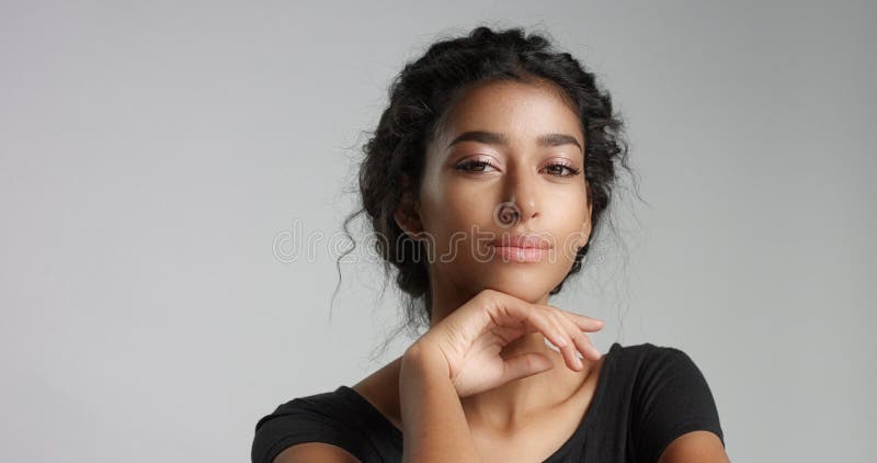Attractive Young Middle Eastern Model Touching Her Pretty Face With
