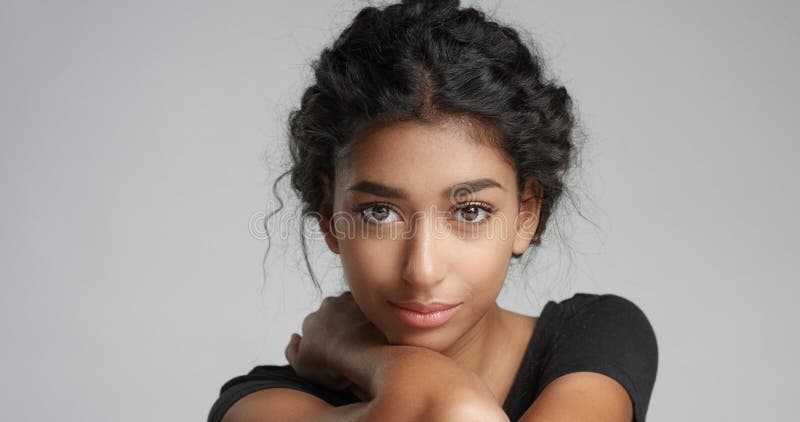 Attractive Young Middle Eastern Model Touching Her Pretty Face with ...