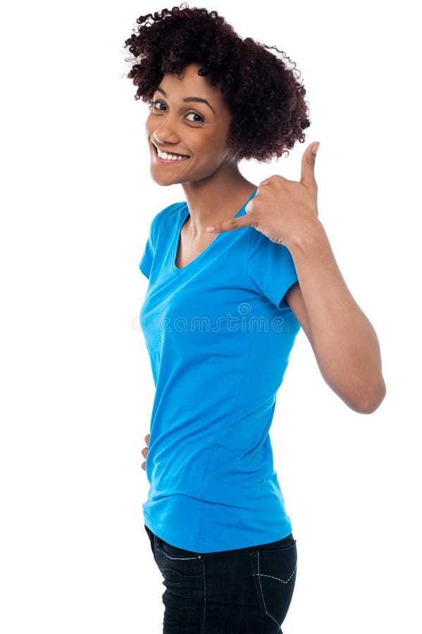 Attractive Young Model Gesturing a Mock Call Stock Image - Image of ...