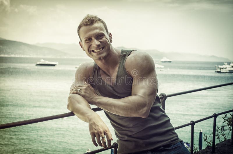 Attractive Young Muscle Man by the Sea Stock Photo - Image of handsome ...