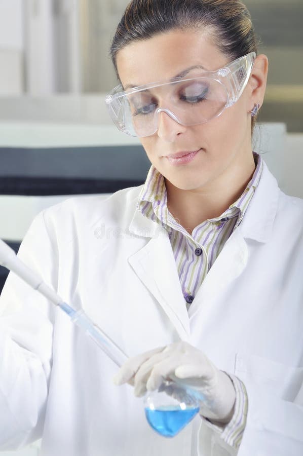 Attractive Young PhD Student Scientist Observing the Color Shift after ...