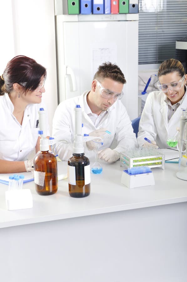 Attractive Young PhD Students Scientists in the Laboratory Stock Image ...