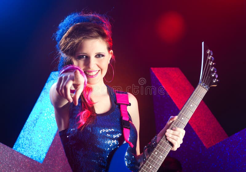 Attractive Young Popstar Pointing at Camera Stock Image - Image of ...