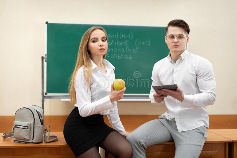 Attractive Kissing Young Students in the Classroom Stock Image - Image ...