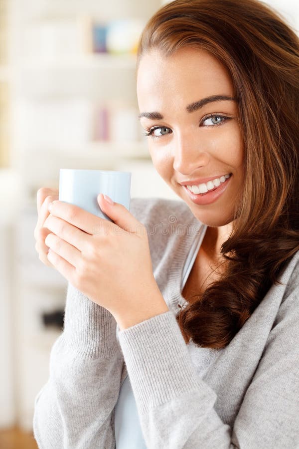 Attractive Young Woman Drinking Coffee at Home Stock Photo - Image of ...