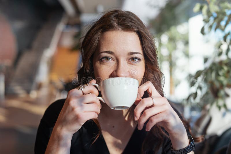 Attractive Woman Drinking Tea at Lunch Break from White Cup and Smiling ...