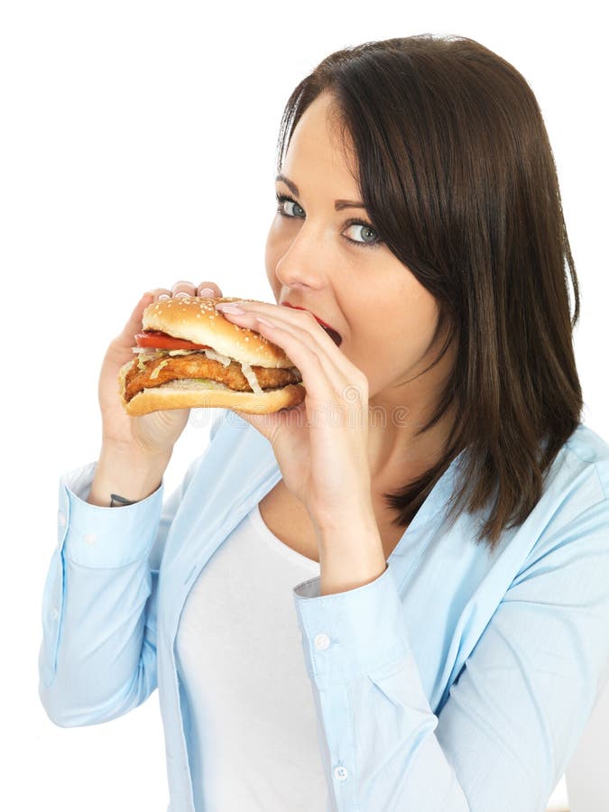 Attractive Young Woman Eating a Chicken Burger Stock Image - Image of ...