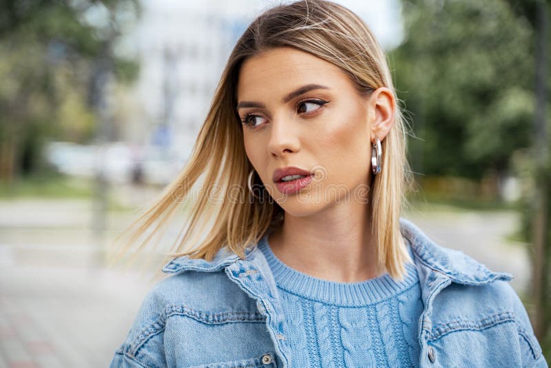 Attractive Young Woman in Her Twenties, Posing Outdoors Fashion Beauty ... Attractive Young Woman in Her Twenties, Posing Outdoors Fashion Beauty ...