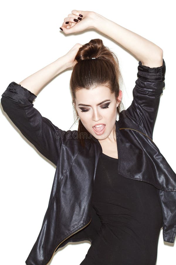 Attractive Young Woman Posing by the Wall. Stock Photo - Image of ...