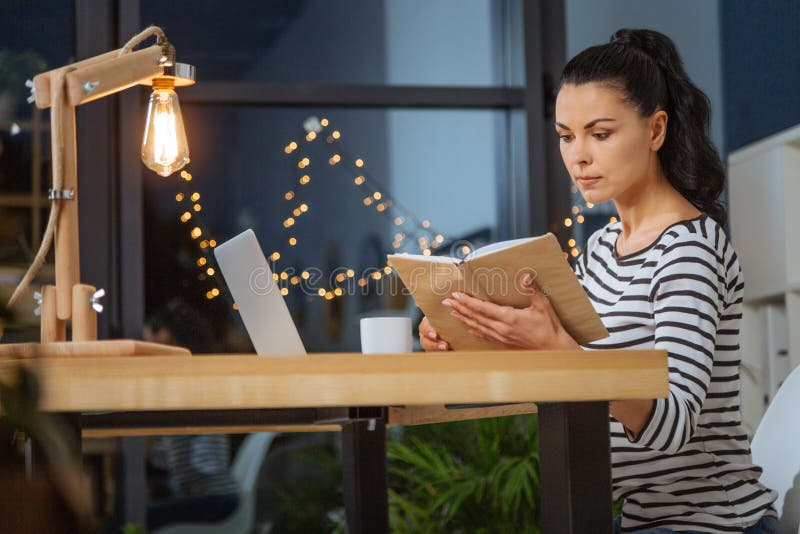 Attractive Young Woman Reading Notes Stock Photo - Image of modern ...