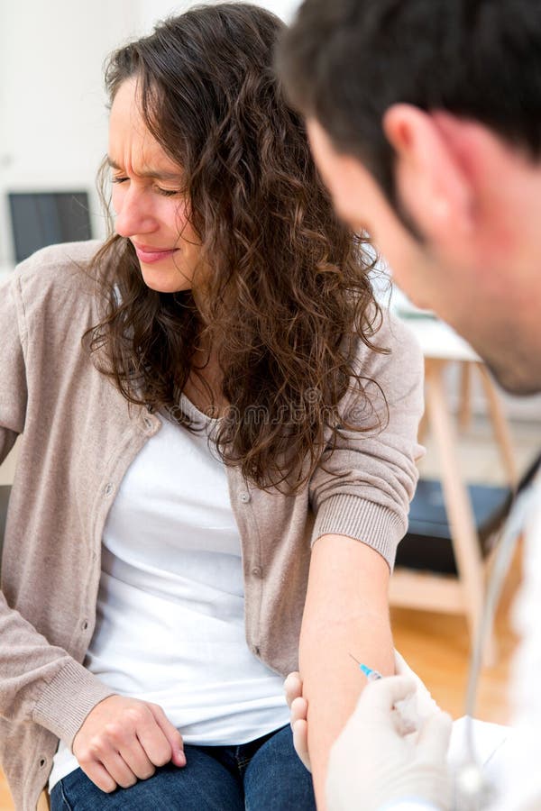 Attractive Young Woman Scared by Injection Stock Image - Image of ...