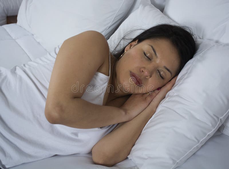 Attractive Young Woman Sleeping Well in Bed. Stock Photo - Image of ...