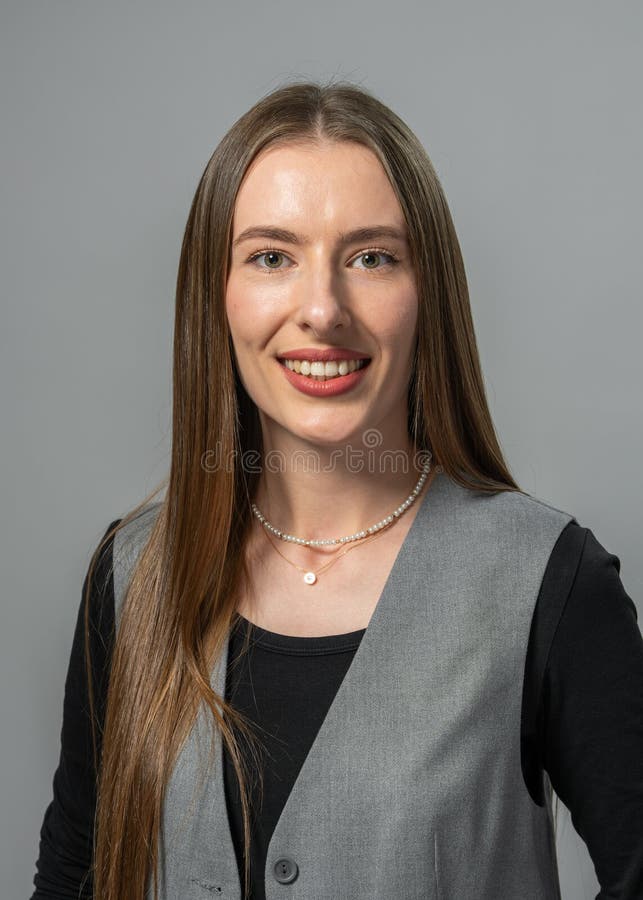 Attractive Young Woman Smiling Gently in Studio Setting. Minimalistic ...