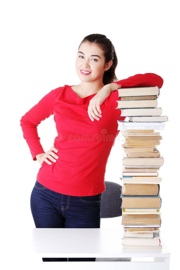 Attractive Young Woman with Stack of Books. Stock Photo - Image of ...