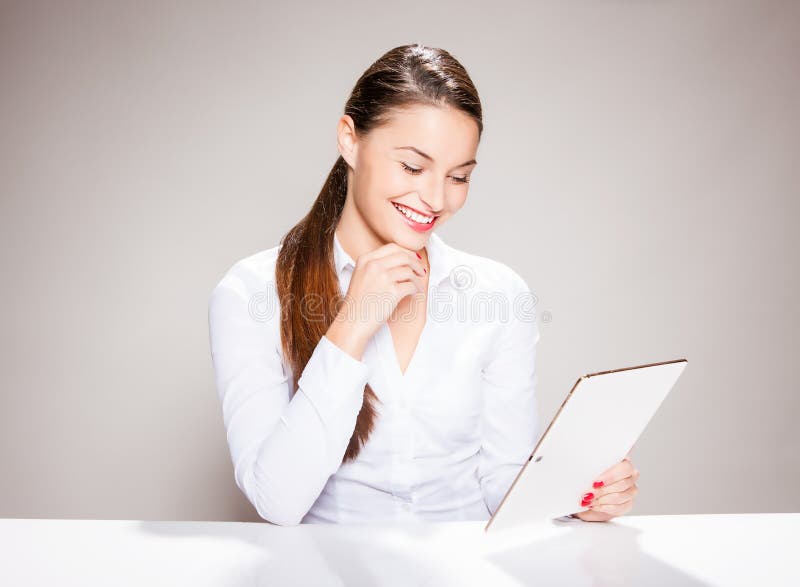 Attractive Young Woman with Tablet. Stock Photo - Image of hair, cute ...