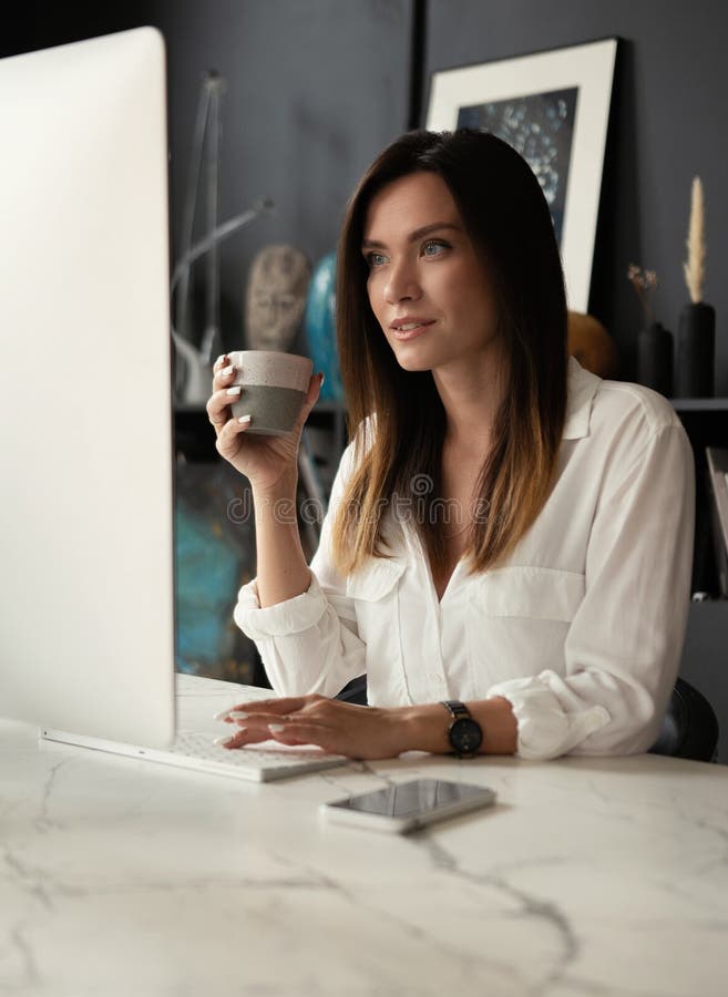 Attractive Young Woman Working at Office, Using Contemporary Desktop ...