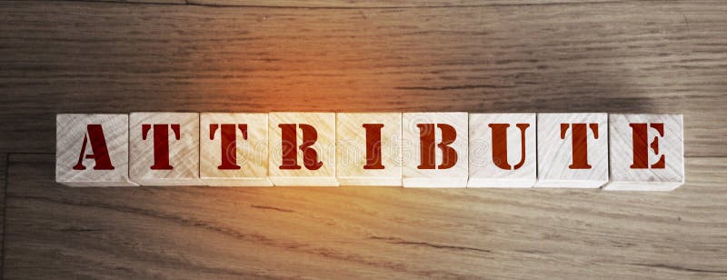 ATTRIBUTE Word Made with Wooden Cubes on Wooden Table. Awards Concept ...