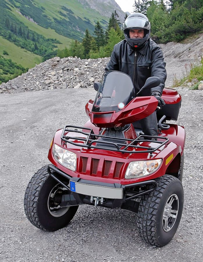 Men on a Red Atv in Romania Quad Stock Image - Image of team, travel ...