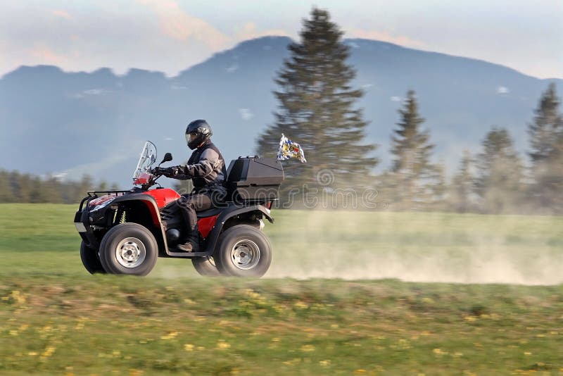 The ATV stock image. Image of interesting, kymco, jacket - 26237347