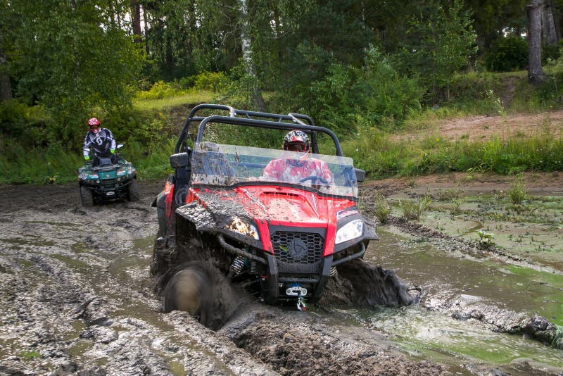 ATV in action stock photo. Image of break, green, active - 60492144