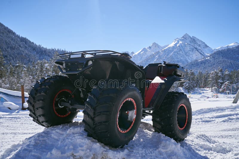 ATV with Big Wheels on the Snow Stock Photo - Image of winter, wheel ...