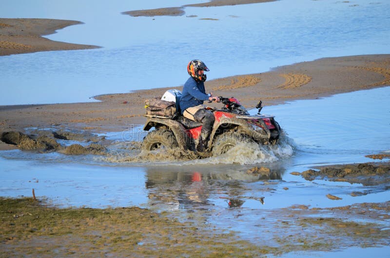 ATV Riding in Mud and Water Editorial Image - Image of recreation ...