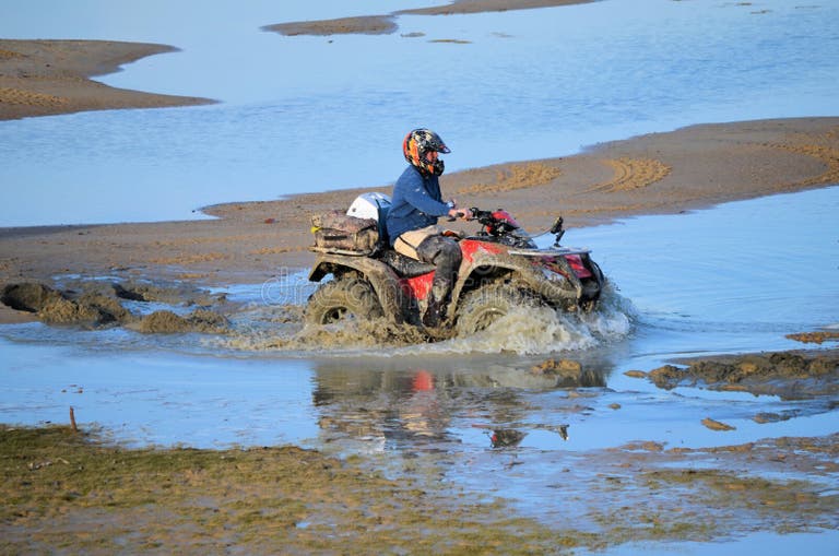 ATV Riding in Mud and Water Editorial Image - Image of recreation ...