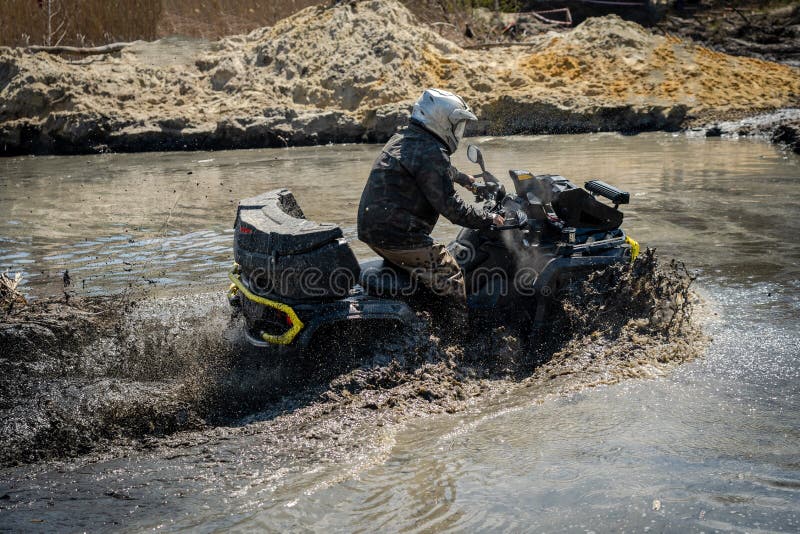 ATV and UTV in Action in Water Track with Water Mud Splash. Extreme ...