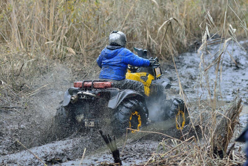 ATV and UTV Driving in Mud and Water Editorial Stock Image - Image of ...