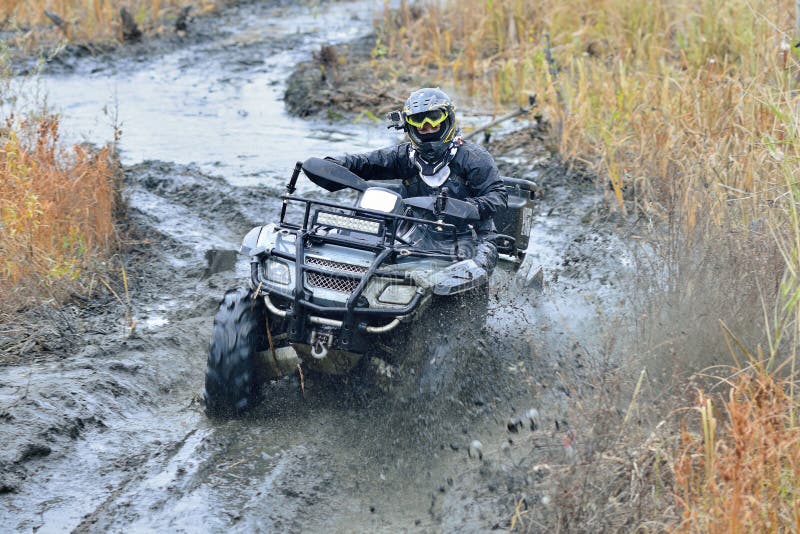 ATV and UTV Driving in Mud and Water Stock Image - Image of autumn ...