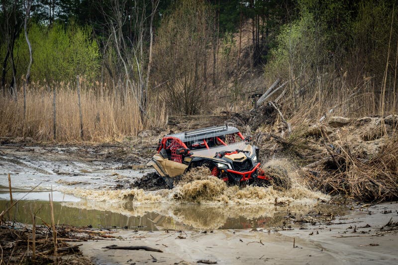 ATV/UTV/4x4 Driving in Muddy Water Editorial Photography - Image of ...