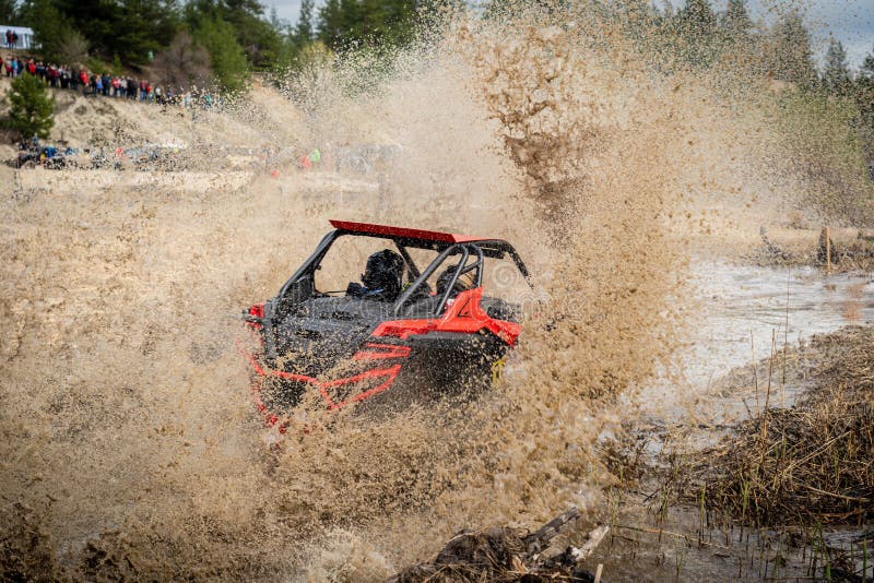 ATV, UTV Hard Driving Over the Mud Off Road Stock Image - Image of ...