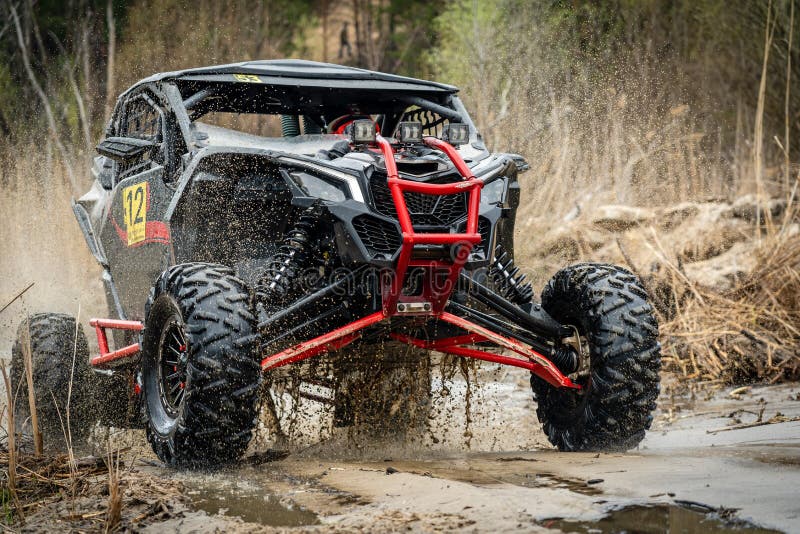 ATV/UTV/4x4 Off-road Vehicle in Muddy Water Editorial Stock Image ...