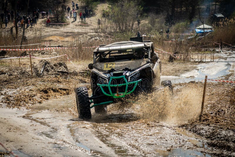ATV/UTV/4x4 Off-road Vehicle in Muddy Water Editorial Image - Image of ...
