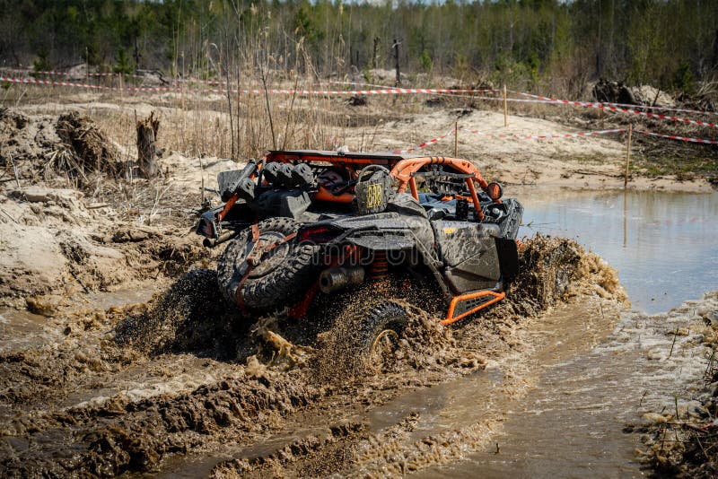 ATV and UTV Offroad Vehicle in Water Road with Mud Splash Stock Photo ...