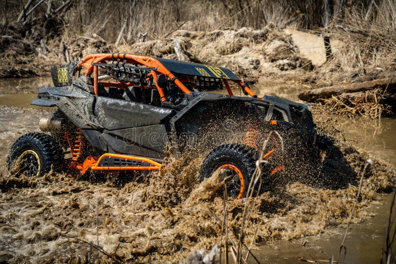 ATV and UTV Offroad Vehicle in Water Road with Mud Splash Stock Image ...