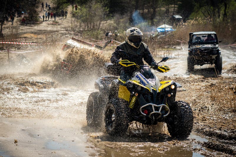 ATV and UTV Riders Driving in Mud Track. Extreme Ride. 4x4 Stock Photo ...