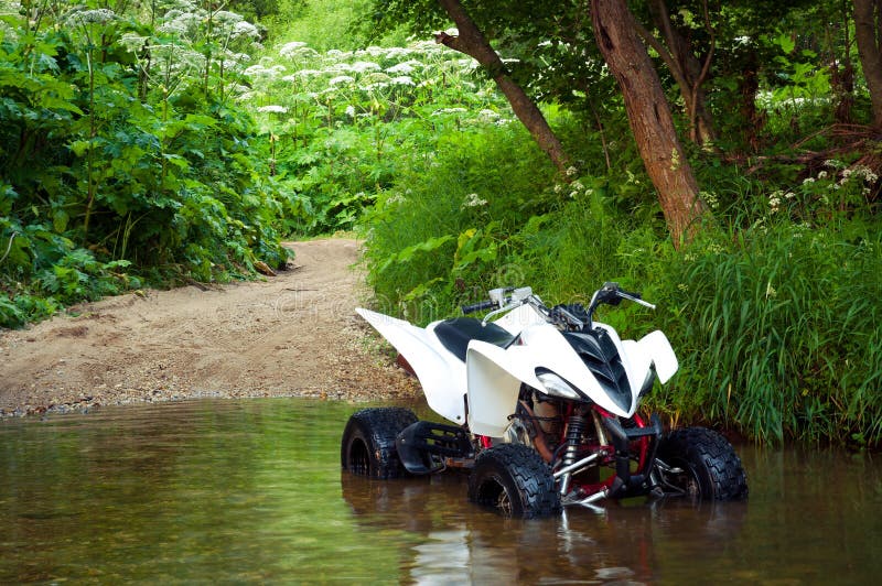 ATV in water stock image. Image of adventure, sport, beautiful - 25648167